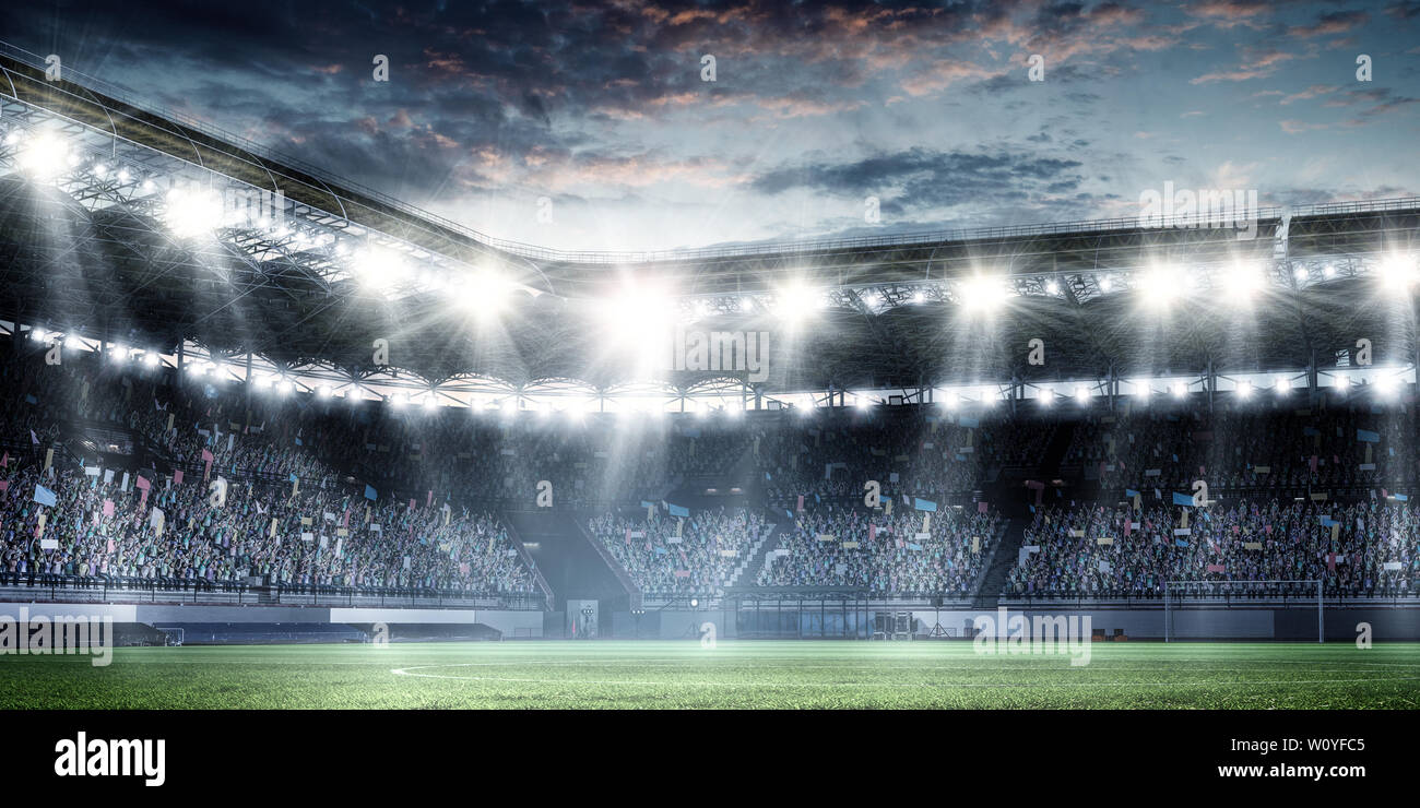 Full night soccer arena in lights and flashes Stock Photo - Alamy