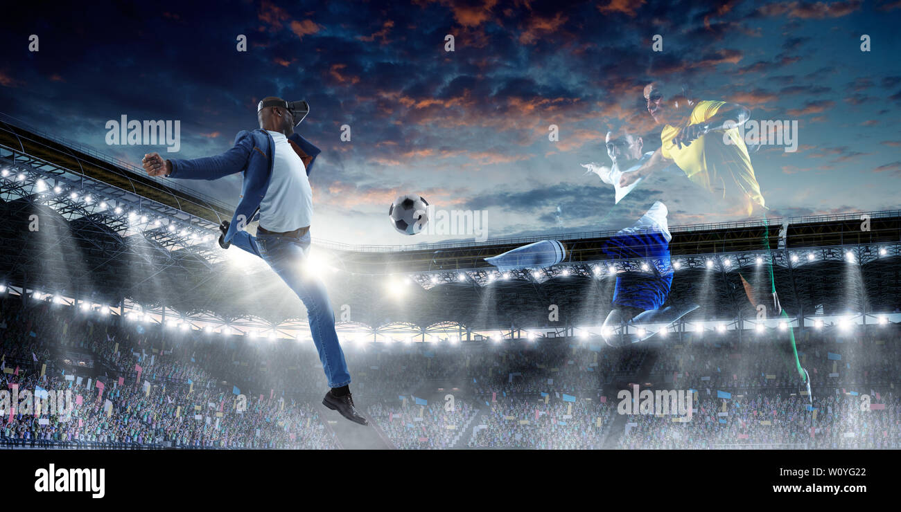 Virtual Reality headset on a black male playing football Stock Photo ...