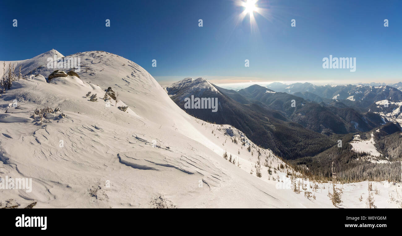 Beautiful winter landscape. Steep mountain hill slope with white deep ...