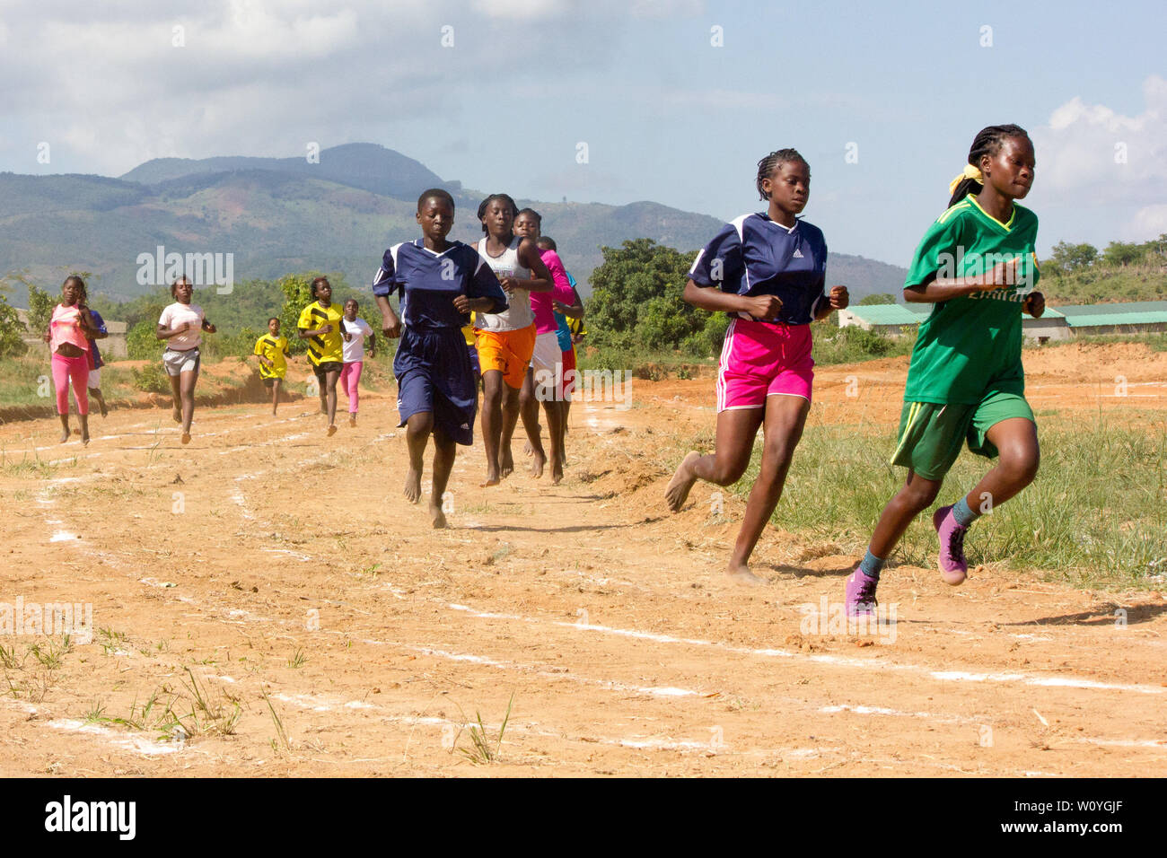 High school girls competing on a running event in their physical ...