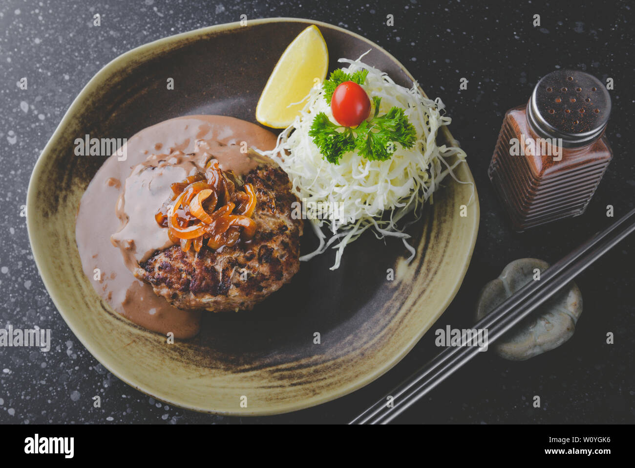 Japanese style hamburger grilled with gravy sauce or hambaku name in ...