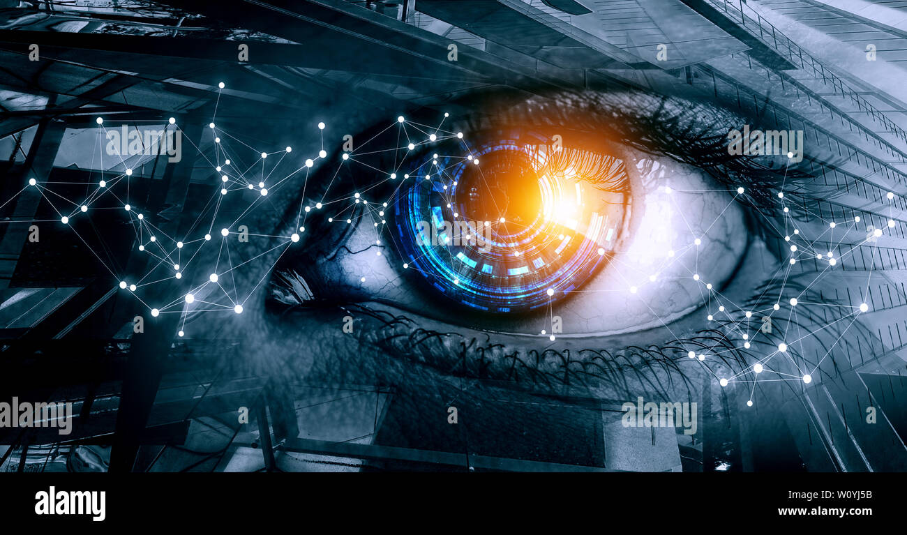 close up of eye with blue digital iris, graph in a foreground and ...