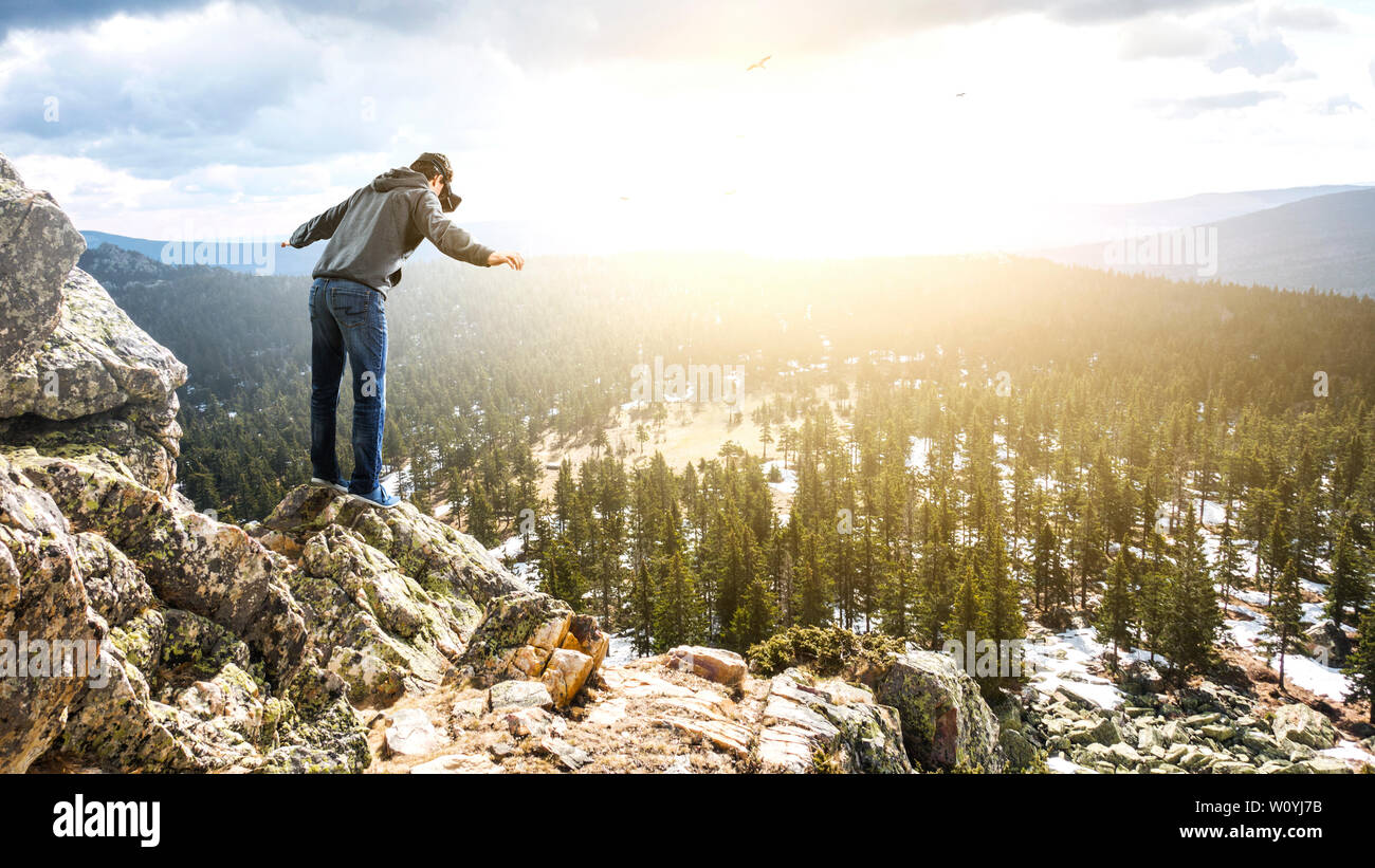 Standing on edge of precipice hi-res stock photography and images - Alamy