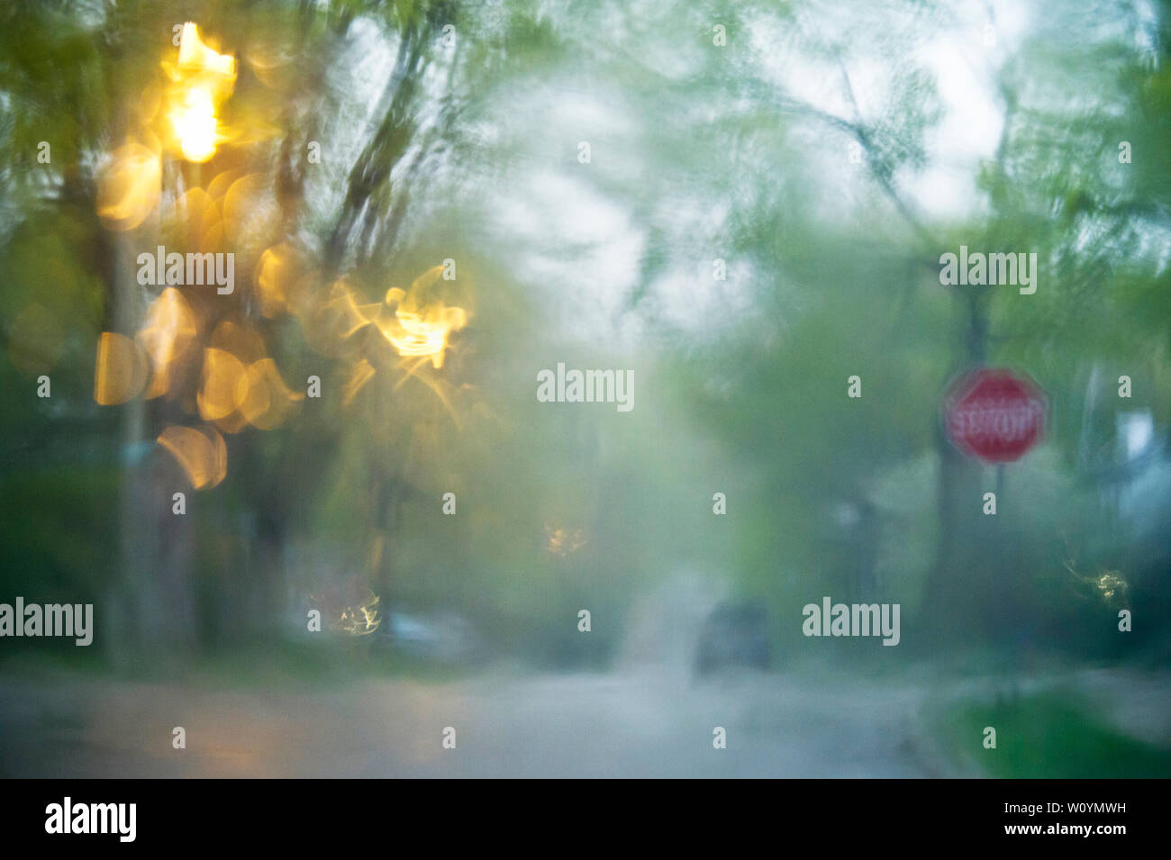 Blurry image of a street during heavy rain Stock Photo - Alamy