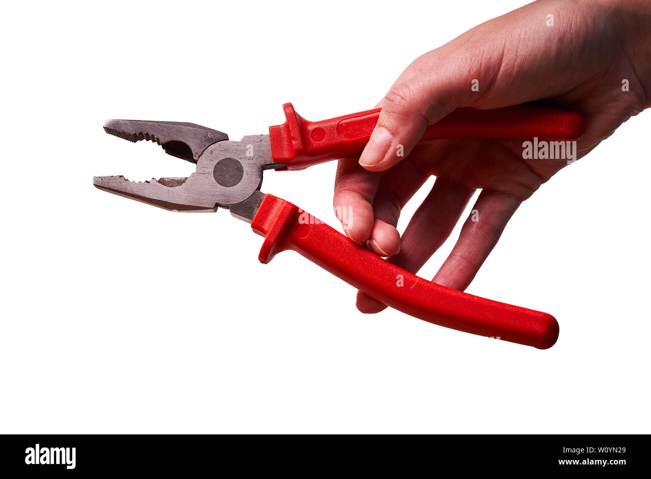 Girl holding a pair of pliers with red handles isolated on white ...