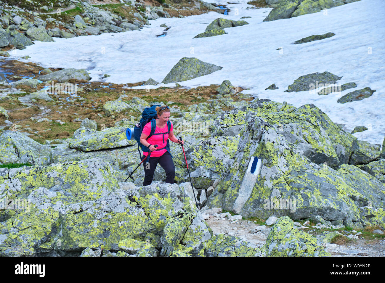 Woman too heavy backpack hi-res stock photography and images - Alamy