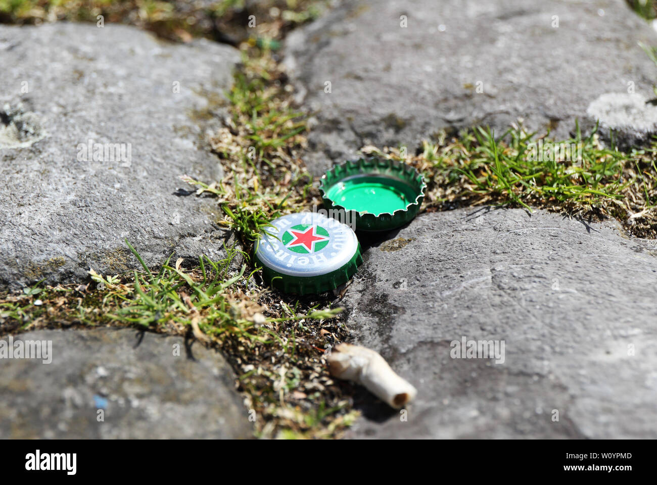 Heineken beer bottle tops Stock Photo - Alamy