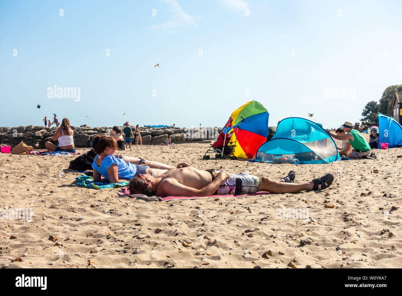 Woman lying sunbathing uk heatwave hi-res stock photography and images ...