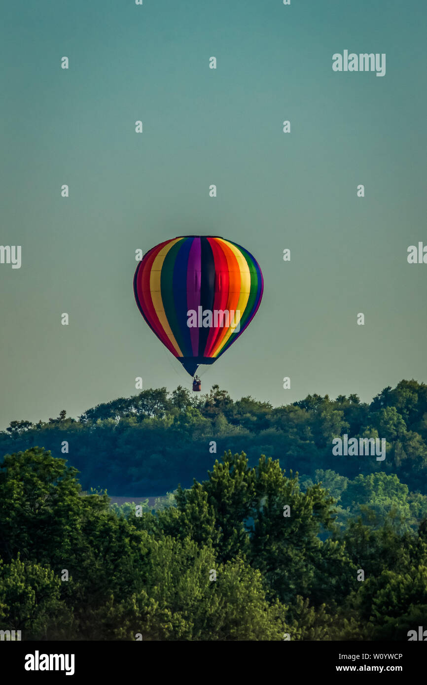 Rainbow colored hot air balloon hi-res stock photography and images - Alamy