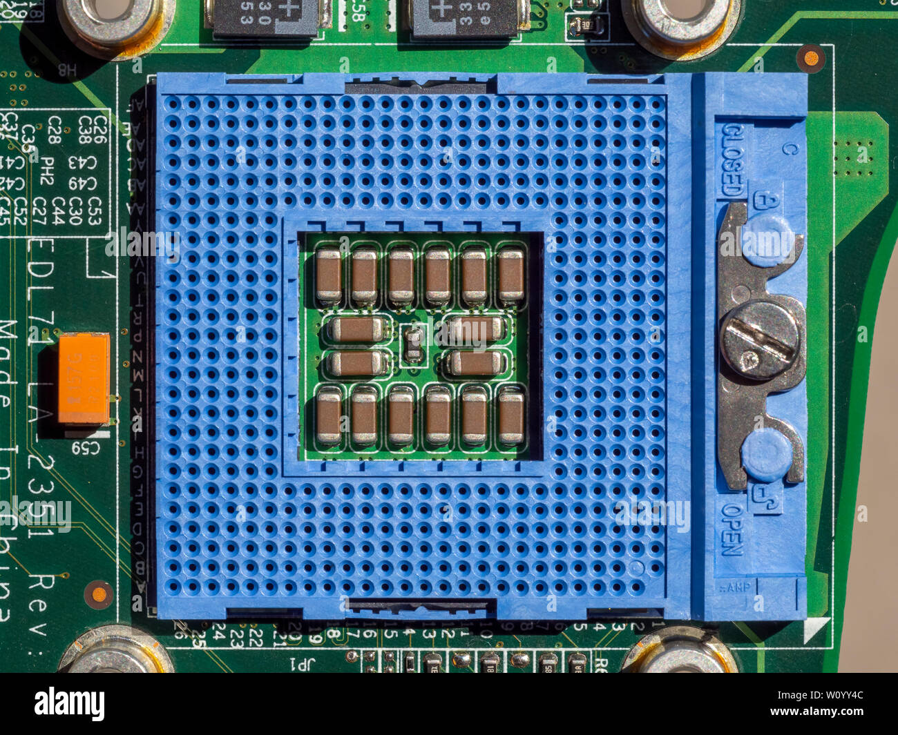 Upgrade computer processor. Empty CPU installing place Stock Photo - Alamy