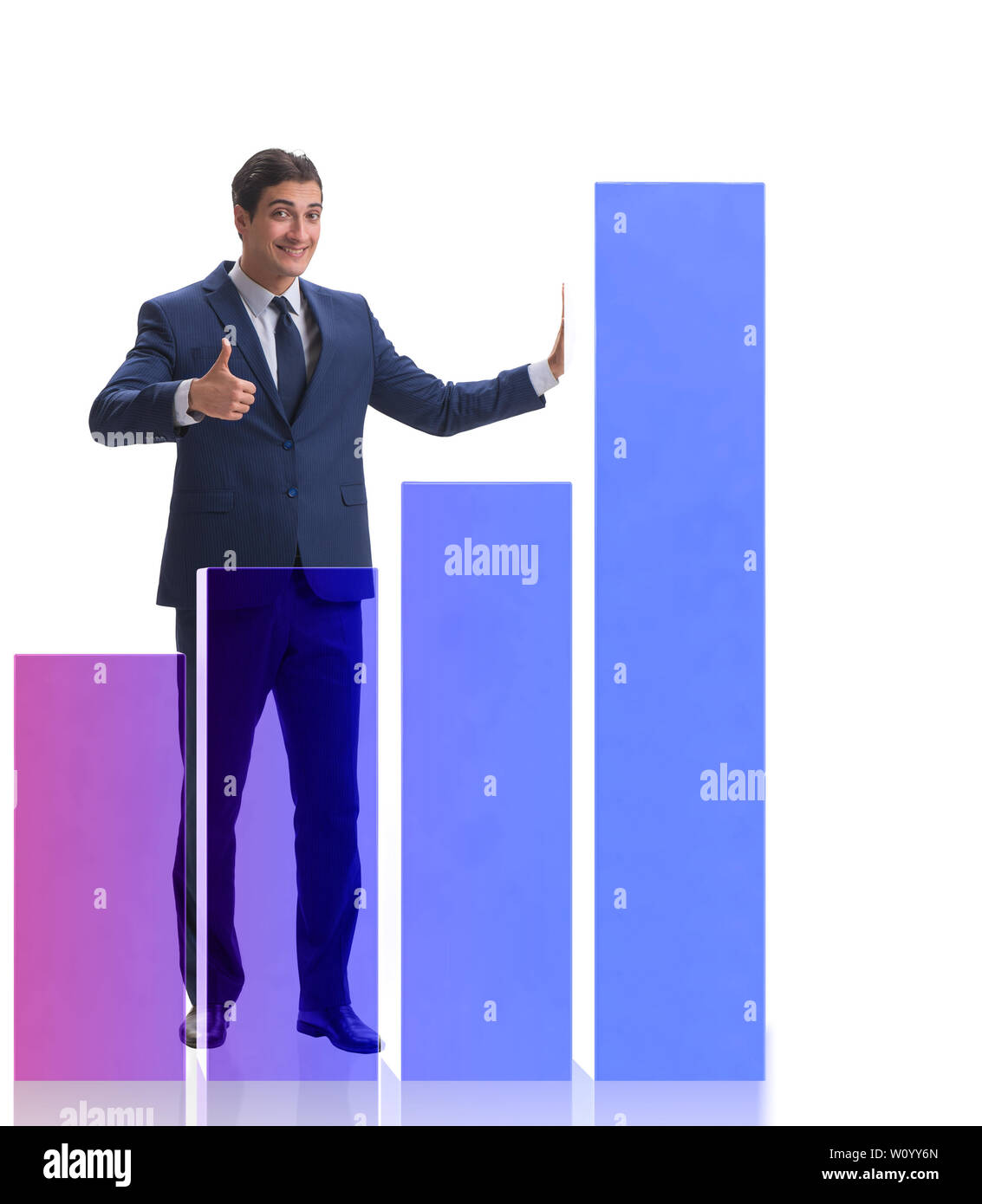 Businessman standing next to bar chart on white background Stock Photo ...