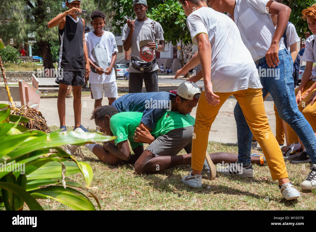 Havana, Cuba - May 14, 2019: Young Teenagers wrestling and having fun ...