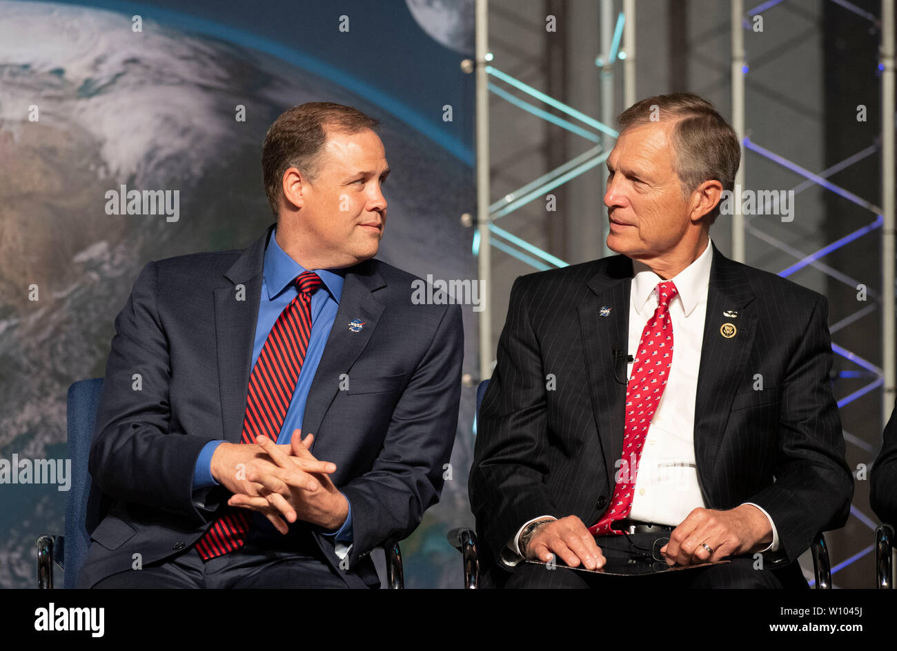 Congressman Dr. Brian Babin of Texas, right, talks with NASA ...