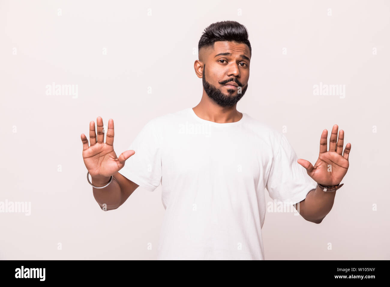 Closeup portrait of shocked, stunned, displeased young man raising ...
