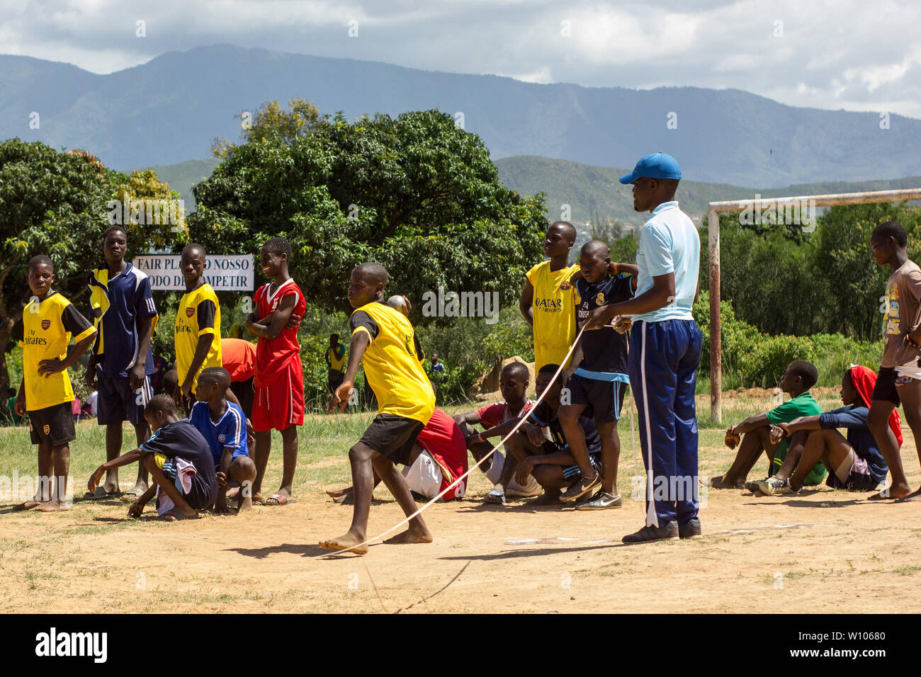 Pupil throwing a sphere in the shot put category in their physical ...