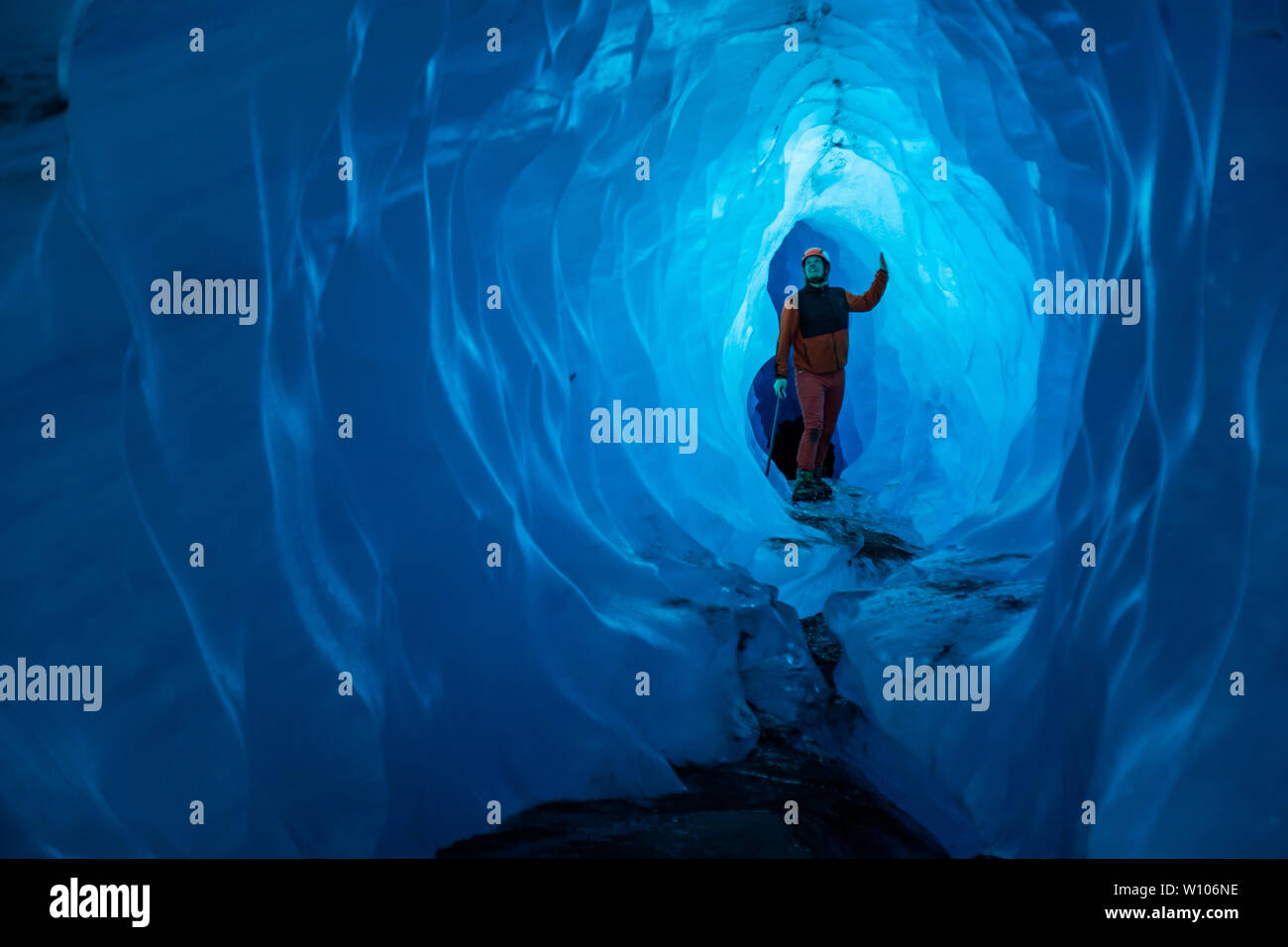 A former moulin tunnel created this ice cave on a glacier in Alaska. A ...