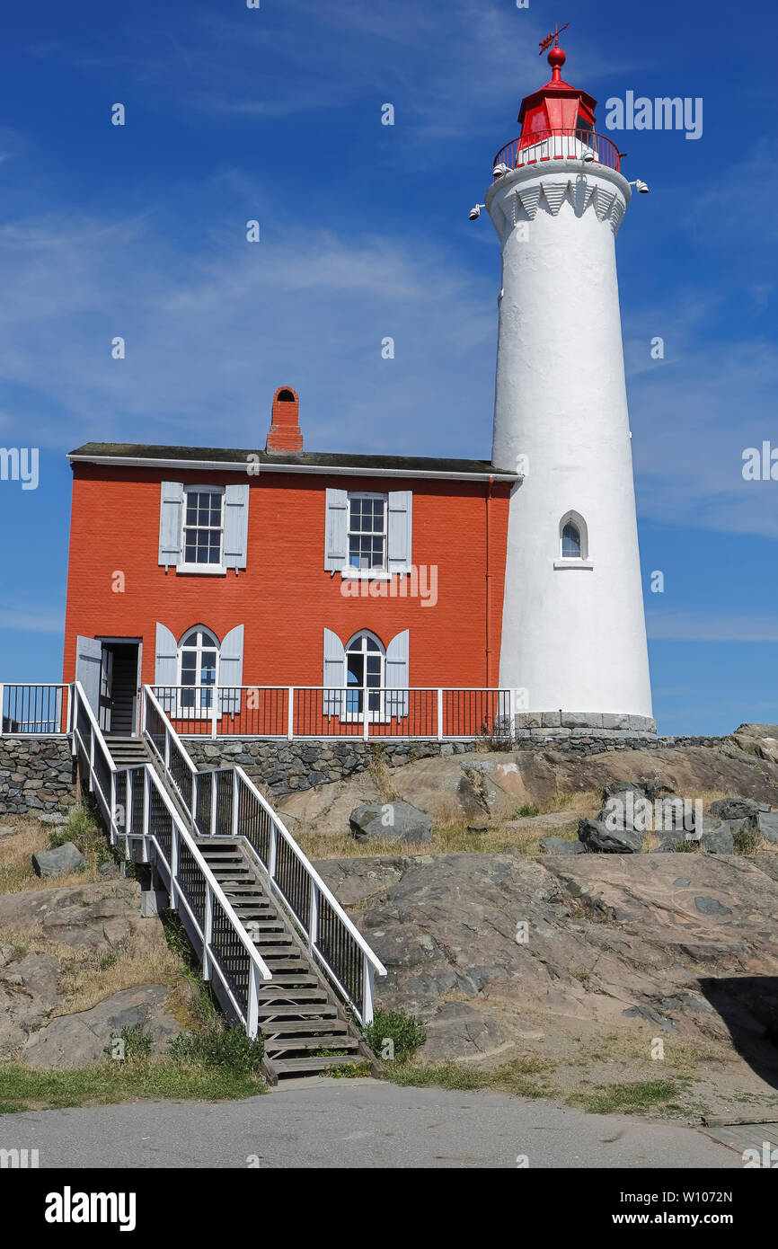A close up of FIsgard Lighthouse under a clear sky in Victoria BC ...