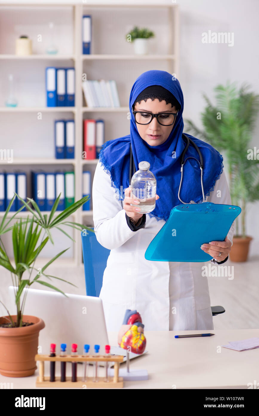 Female doctor in hijab working in the hospital Stock Photo - Alamy