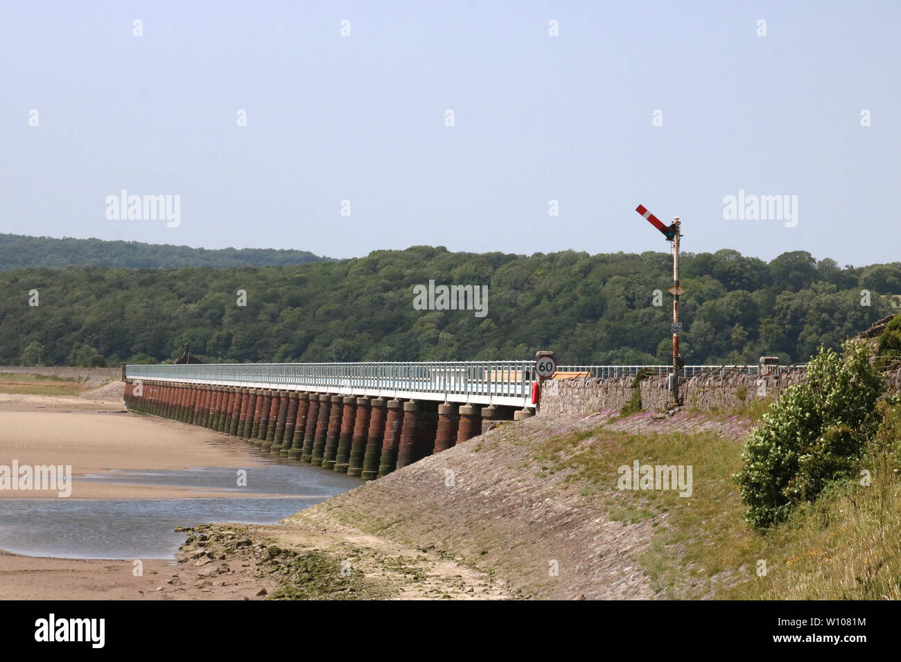 View from Arnside in Cumbria looking at the Arnside railway viaduct ...