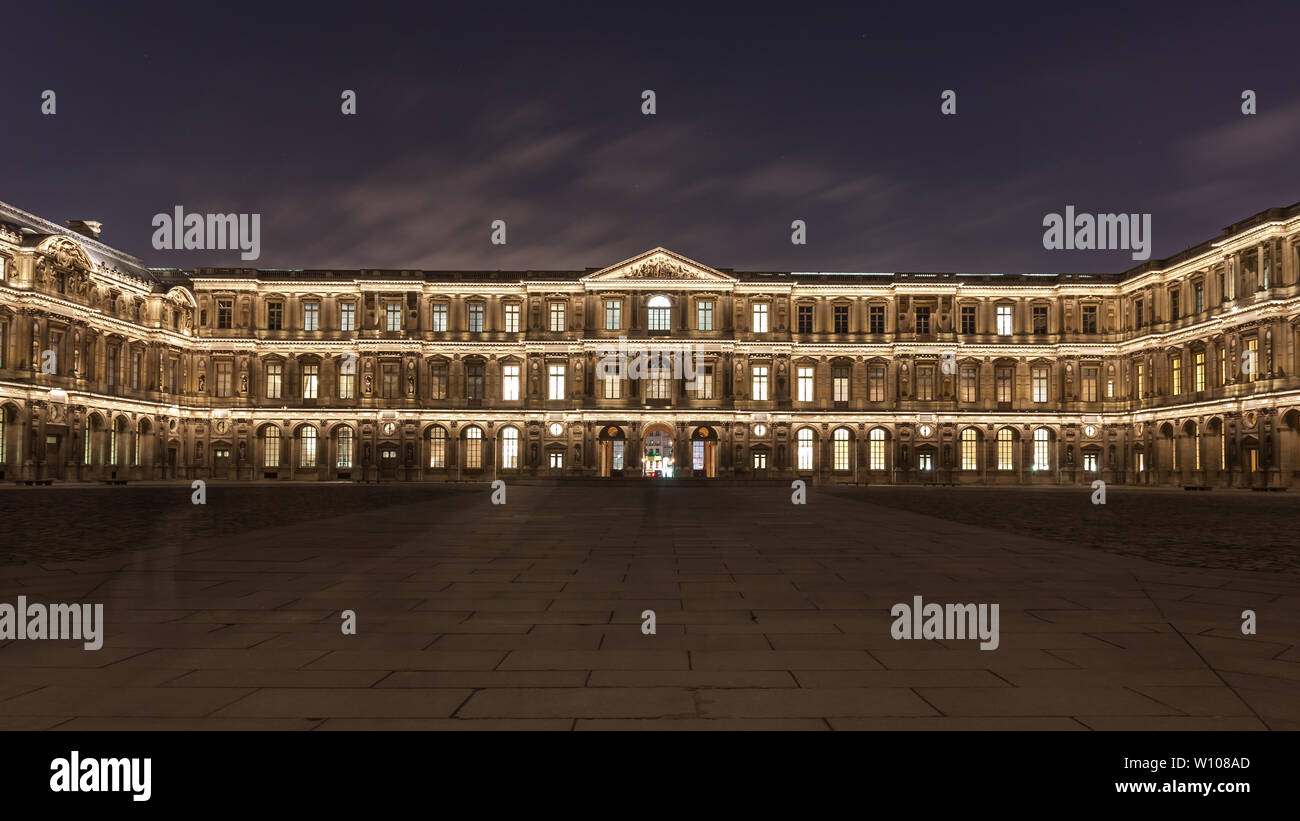 Louvre Museum in Paris at nightis. A central landmark of Paris, France ...