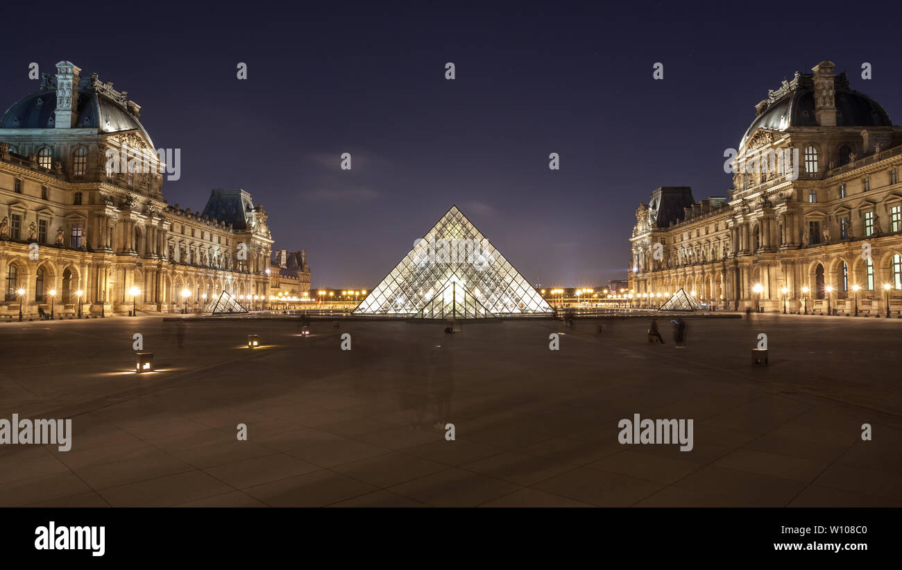 Louvre Museum in Paris at nightis. A central landmark of Paris, France ...