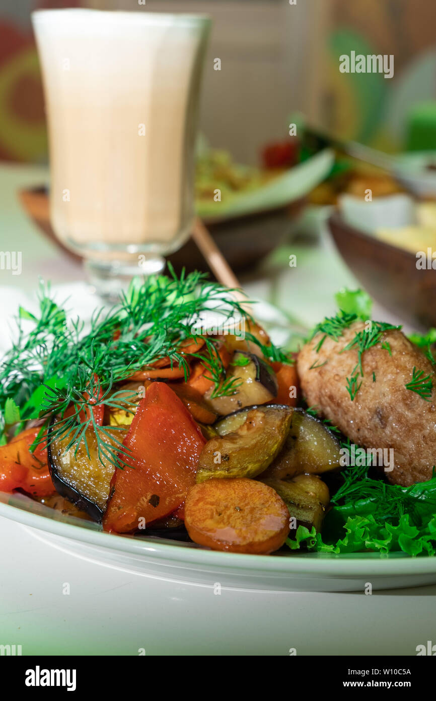 National Jewish dish - pike cutlet with vegetables Stock Photo - Alamy