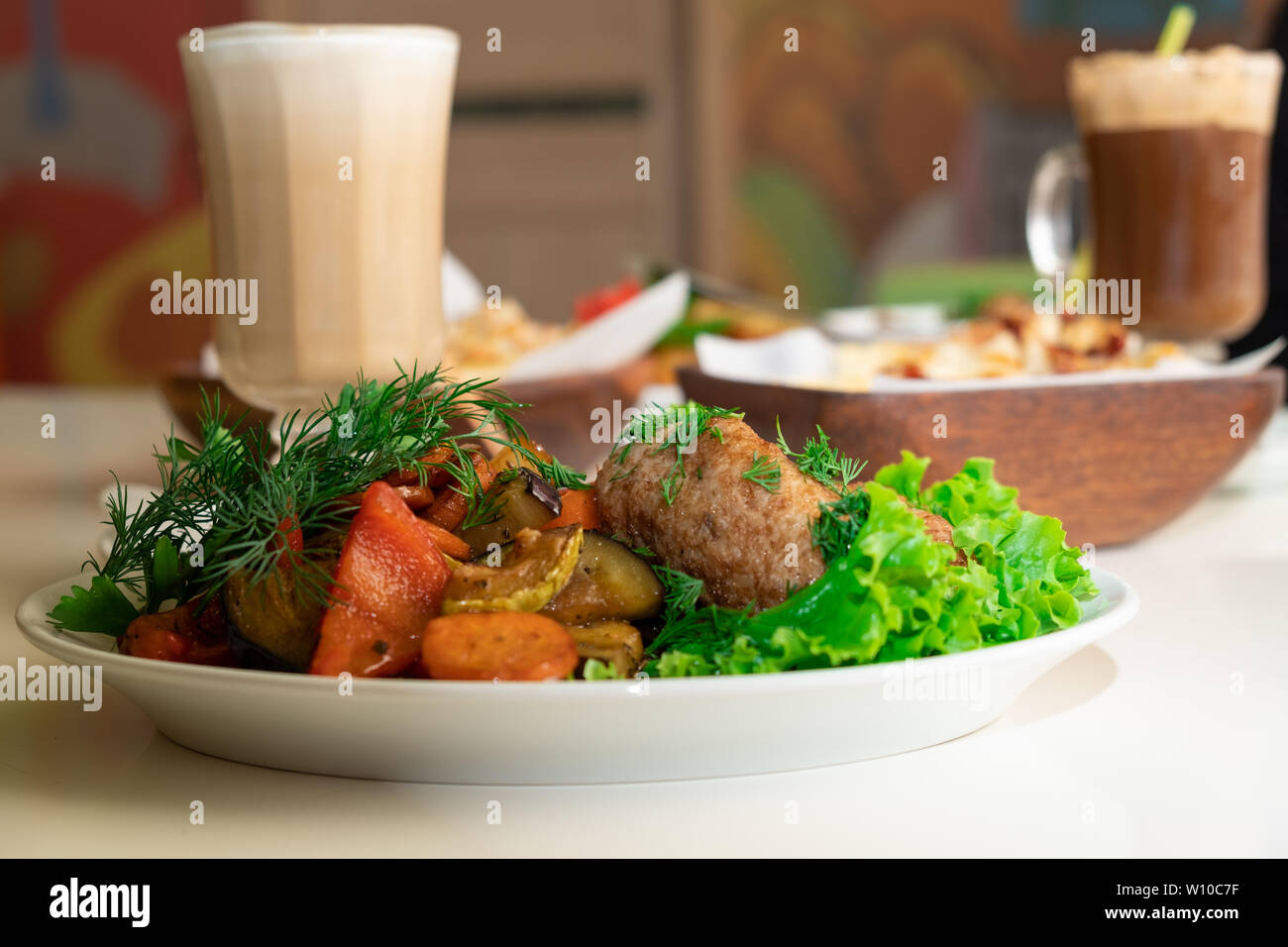 National Jewish dish - pike cutlet with vegetables Stock Photo - Alamy
