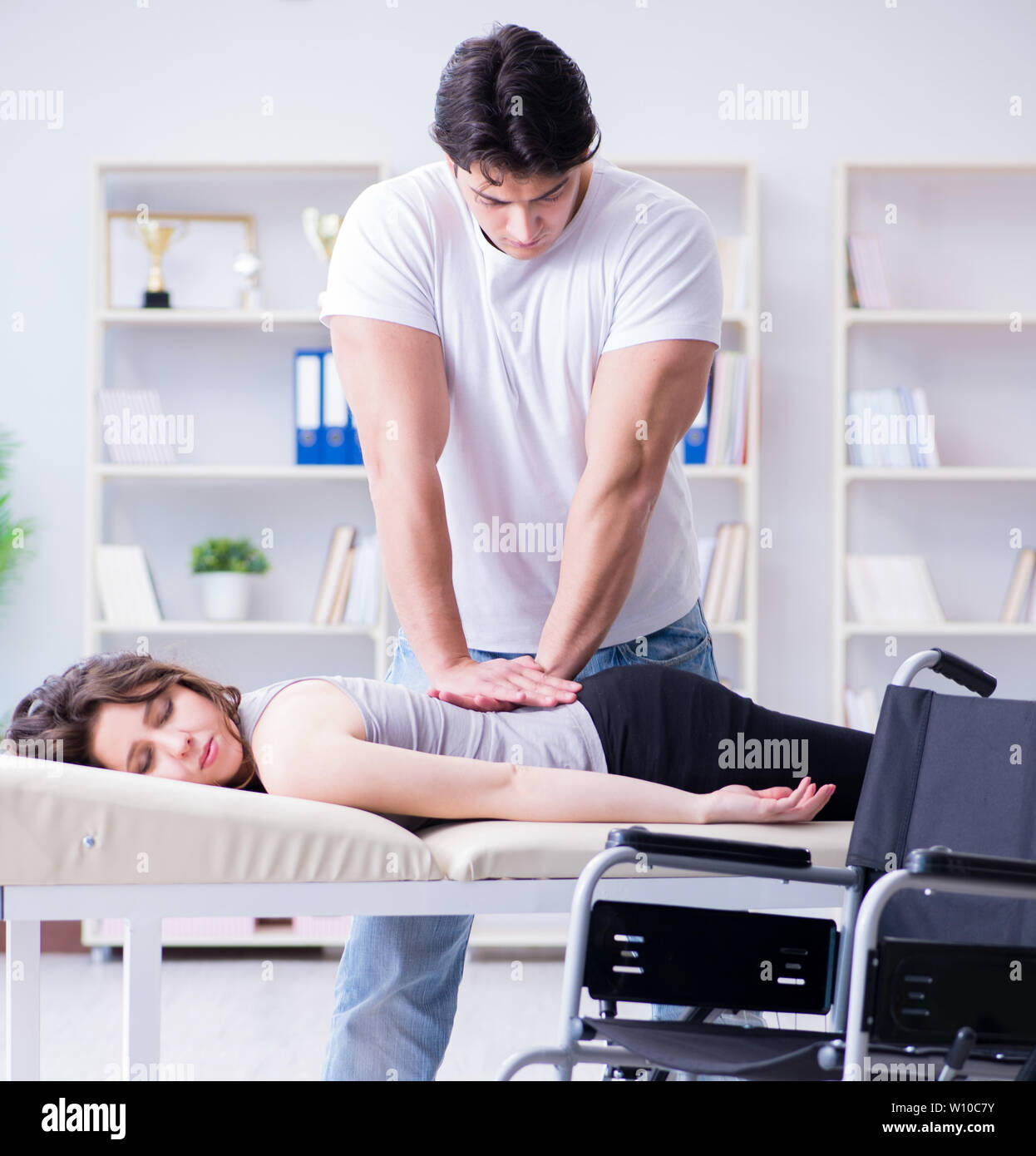 Patient undergoing rehabilitation recovery programme with doctor Stock ...