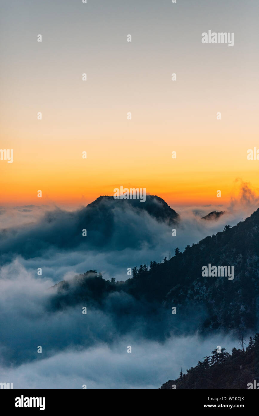 View of marine layer low clouds over Los Angeles at sunset, from Mount ...