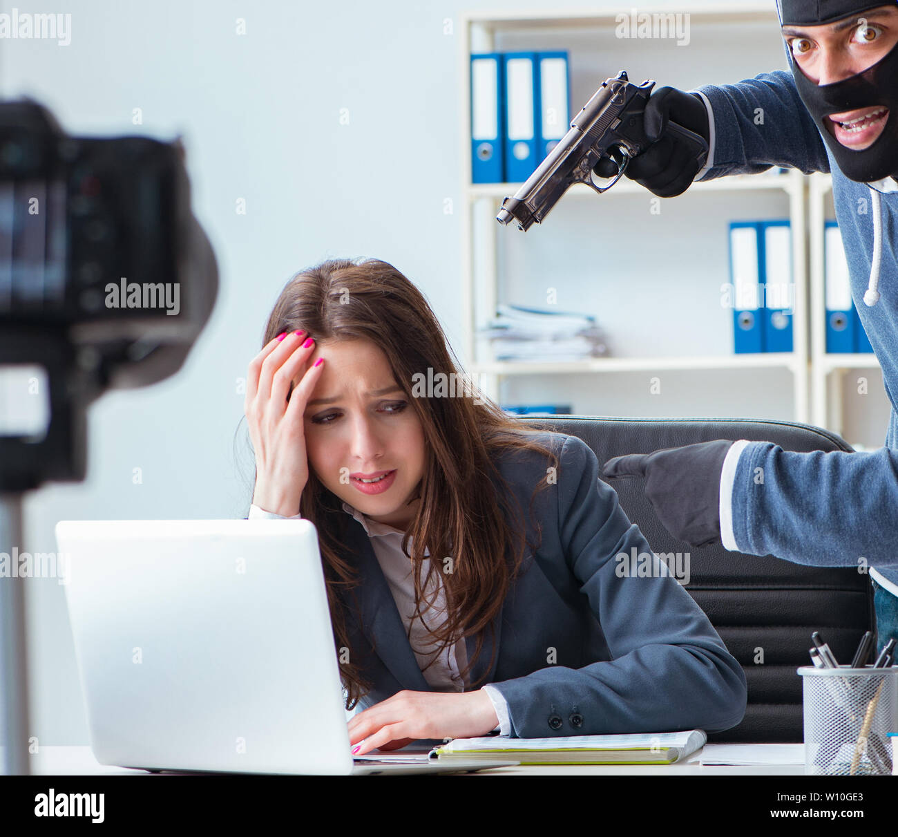 Criminal recording message for ransom with victim businesswoman Stock ...