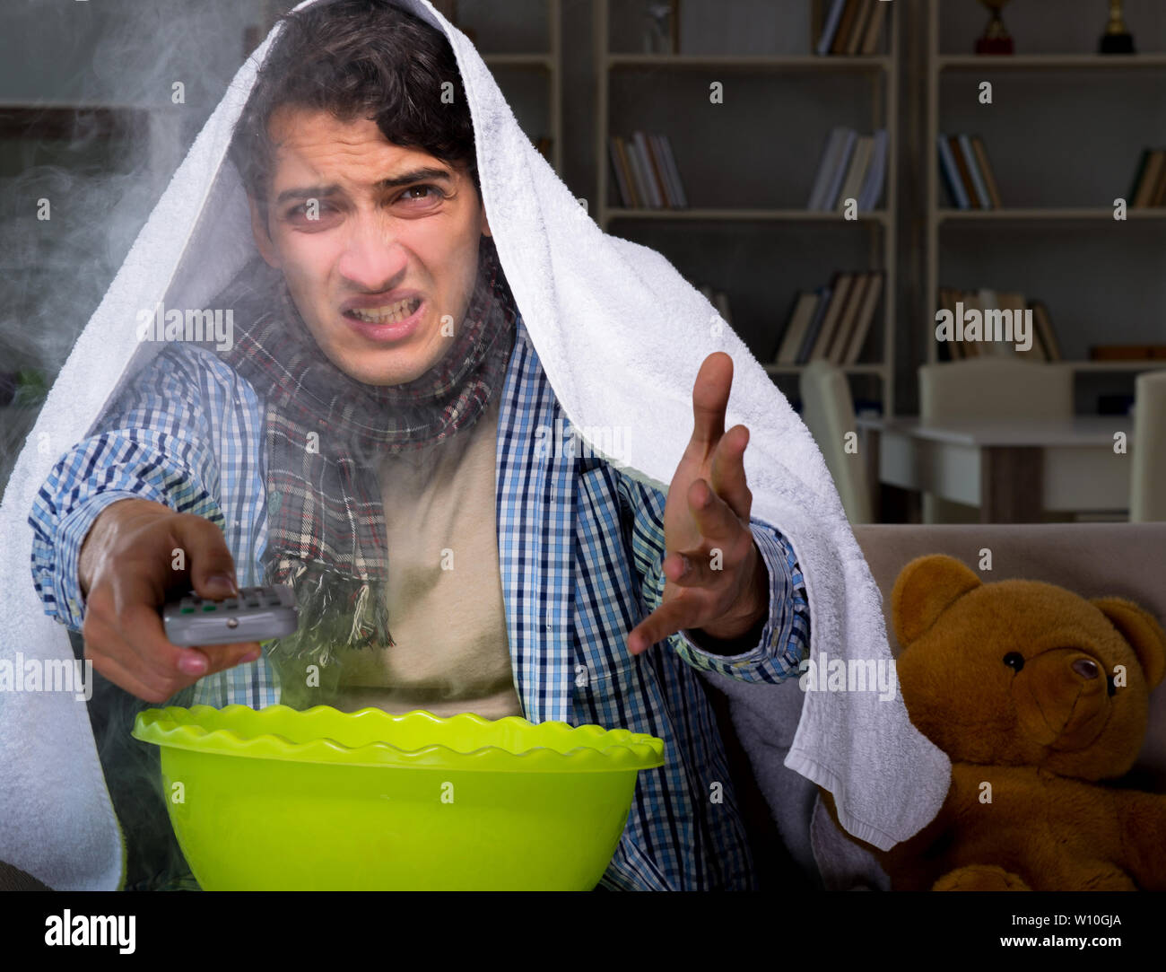 Sick man doing inhalation at night in home Stock Photo - Alamy