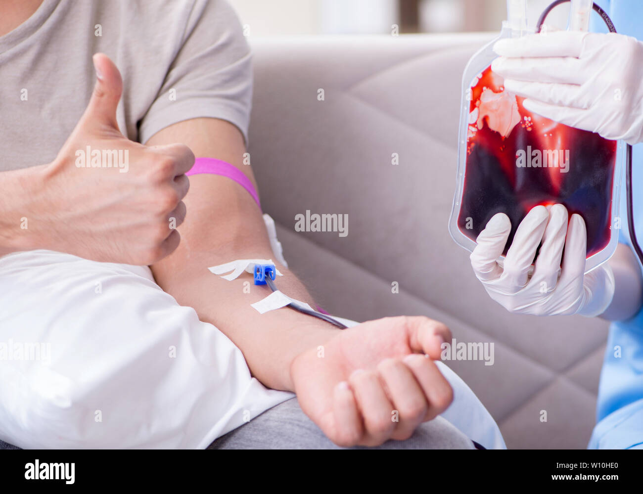 Patient getting blood transfusion in hospital clinic Stock Photo - Alamy