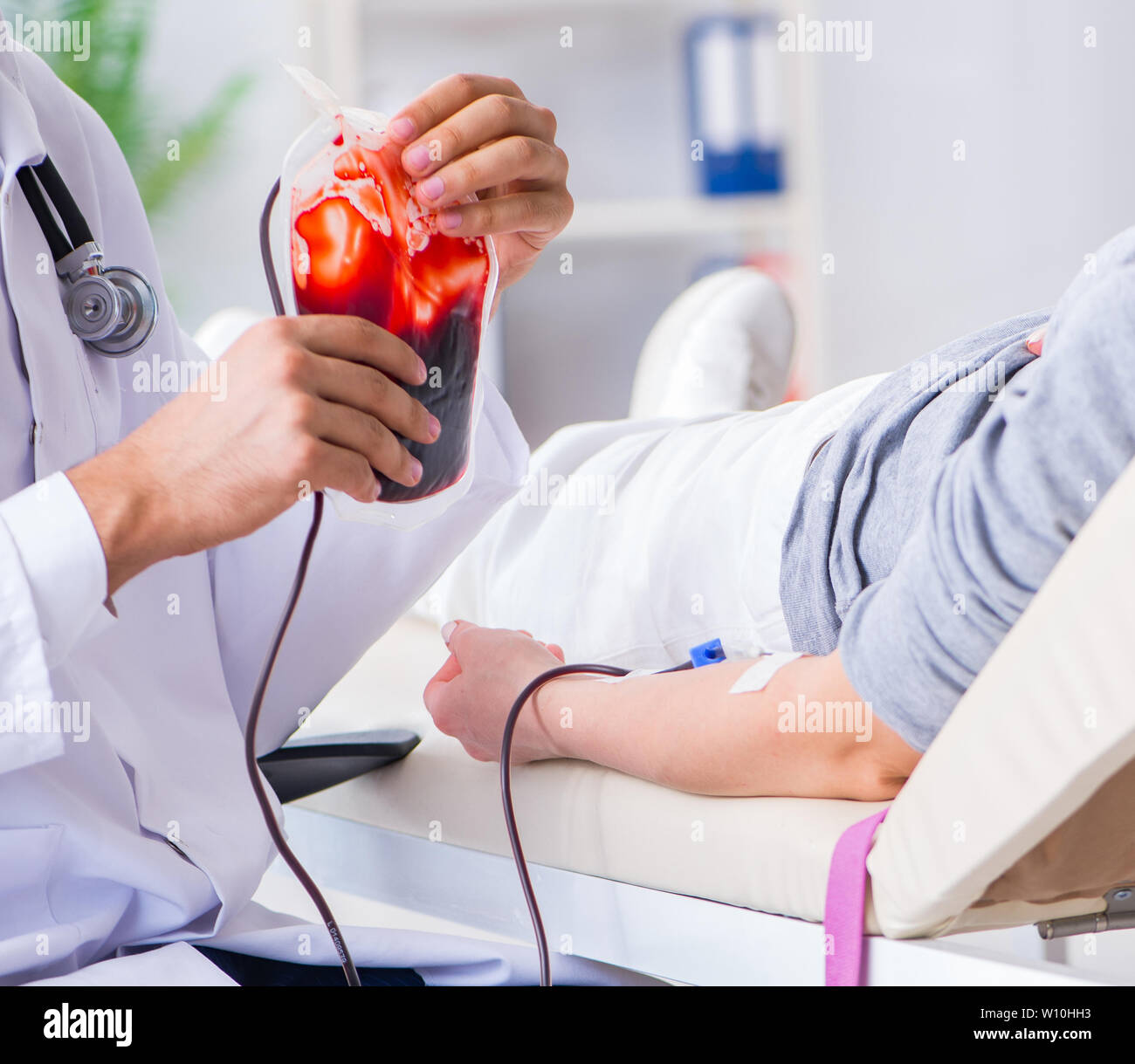 Patient getting blood transfusion in hospital clinic Stock Photo - Alamy