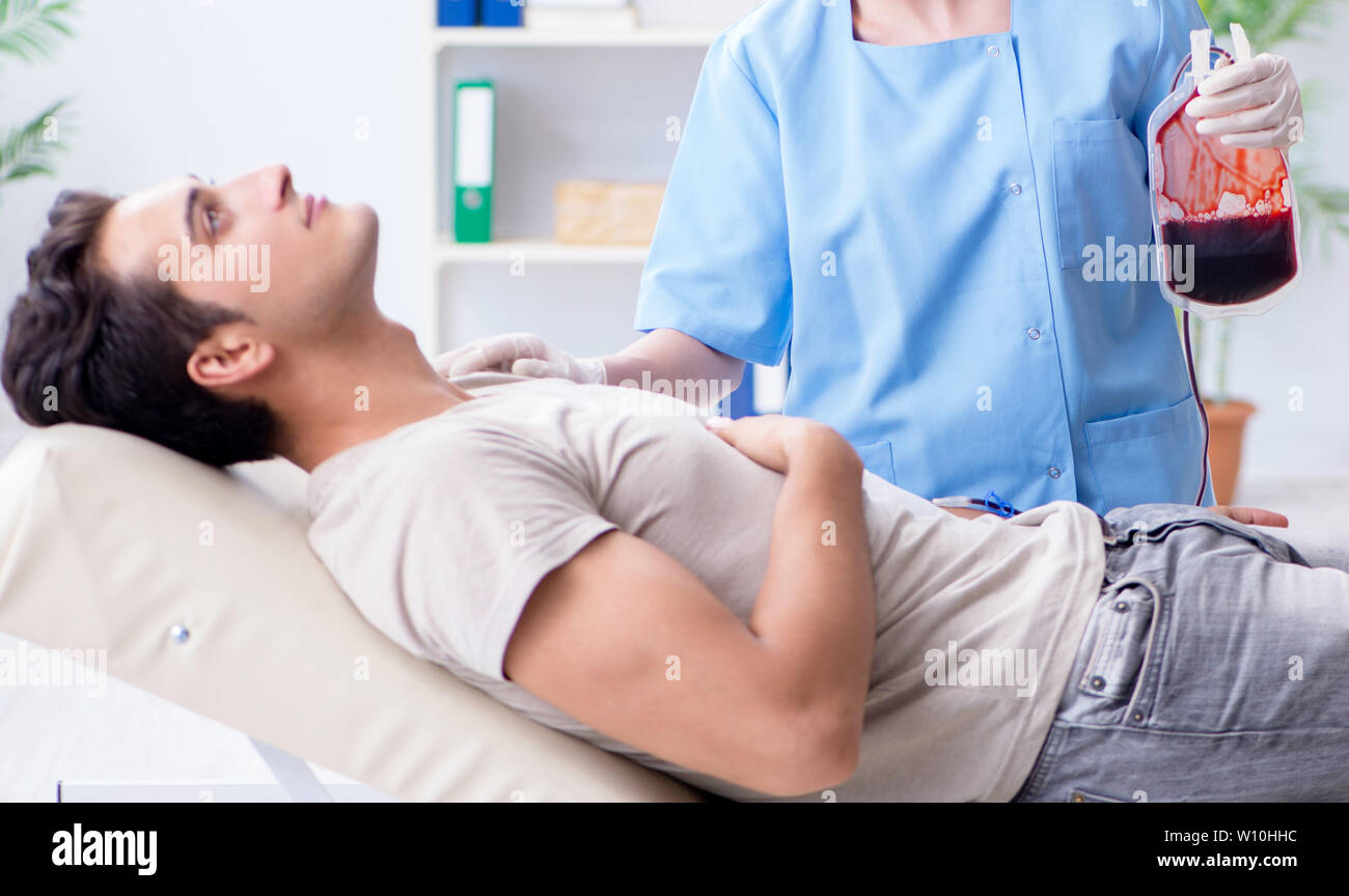 Patient getting blood transfusion in hospital clinic Stock Photo - Alamy