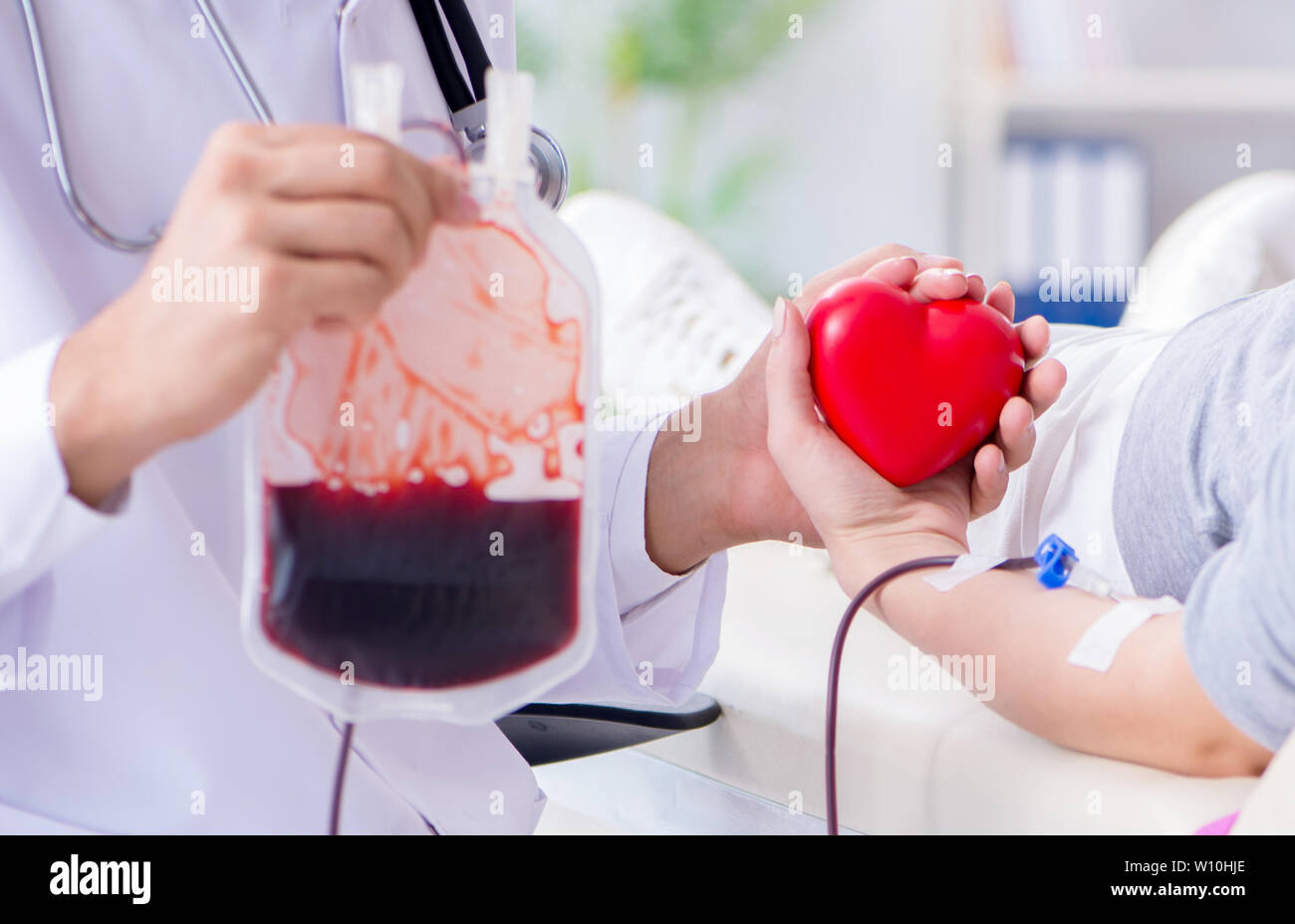 Patient getting blood transfusion in hospital clinic Stock Photo - Alamy