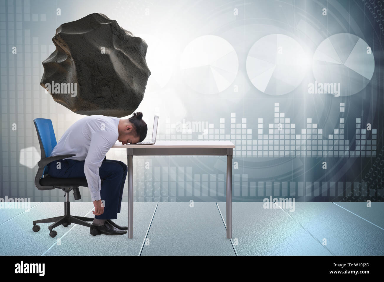 Employee under the burden of work Stock Photo - Alamy