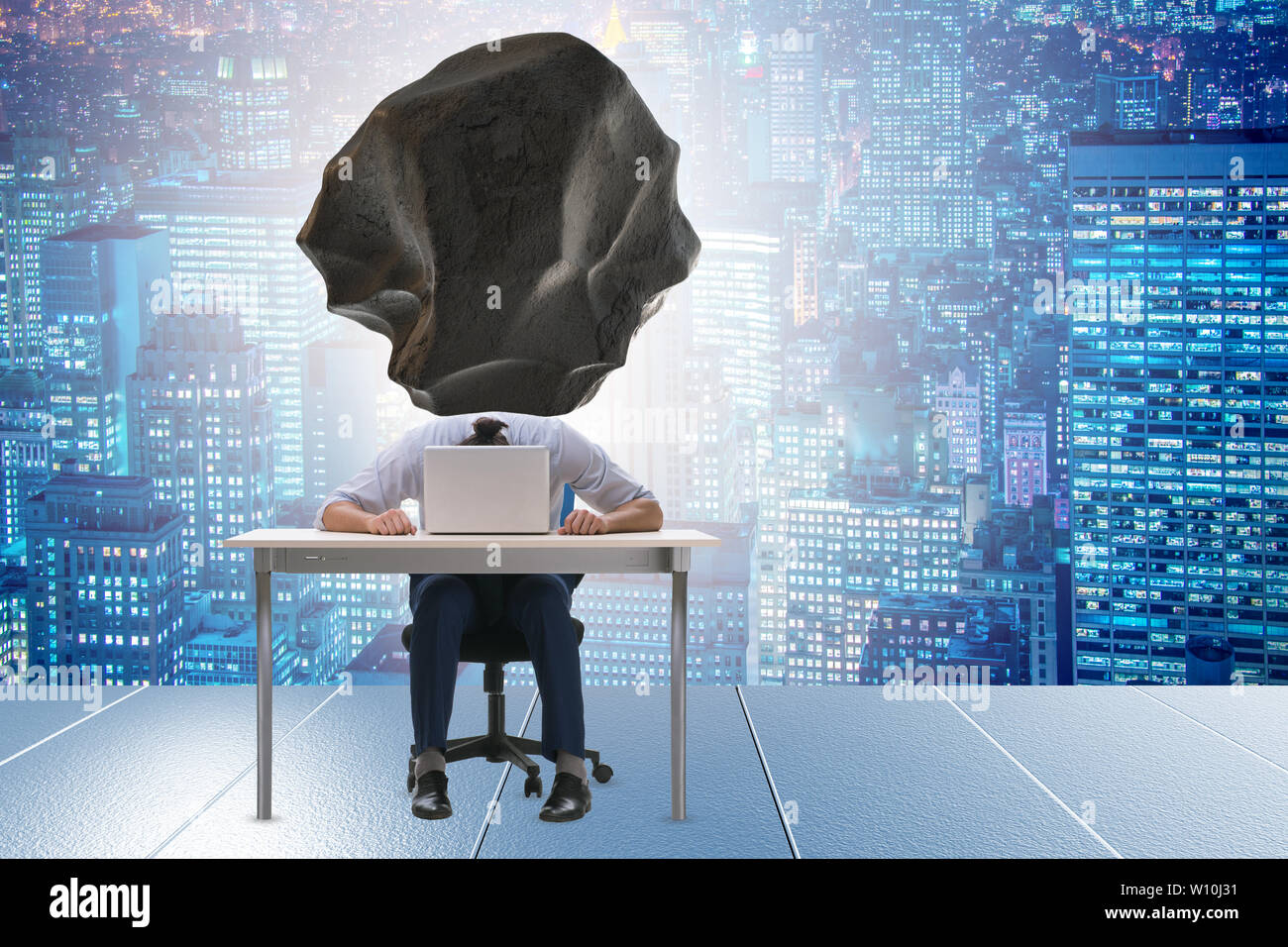 Employee under the burden of work Stock Photo - Alamy
