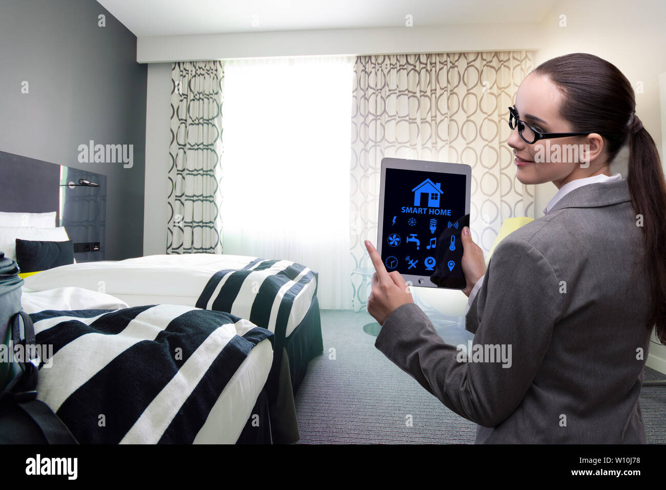 Smart home concept with woman Stock Photo - Alamy