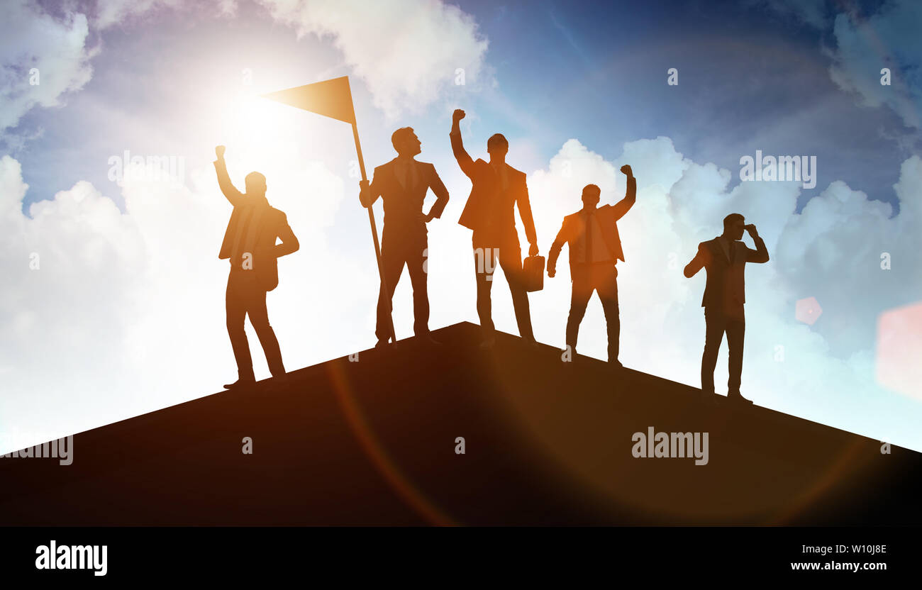 Businessmen in achievement and teamwork concept Stock Photo - Alamy
