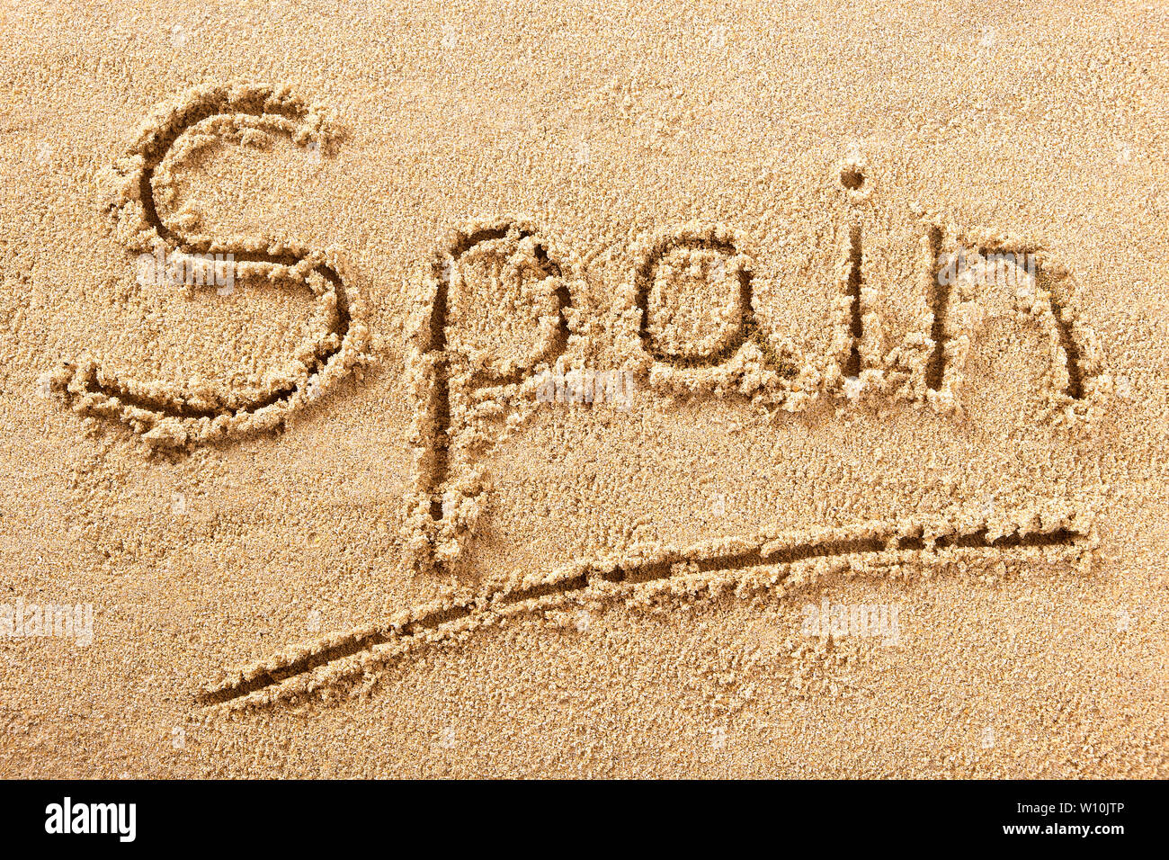 Spain hand written beach word travel concept Stock Photo - Alamy