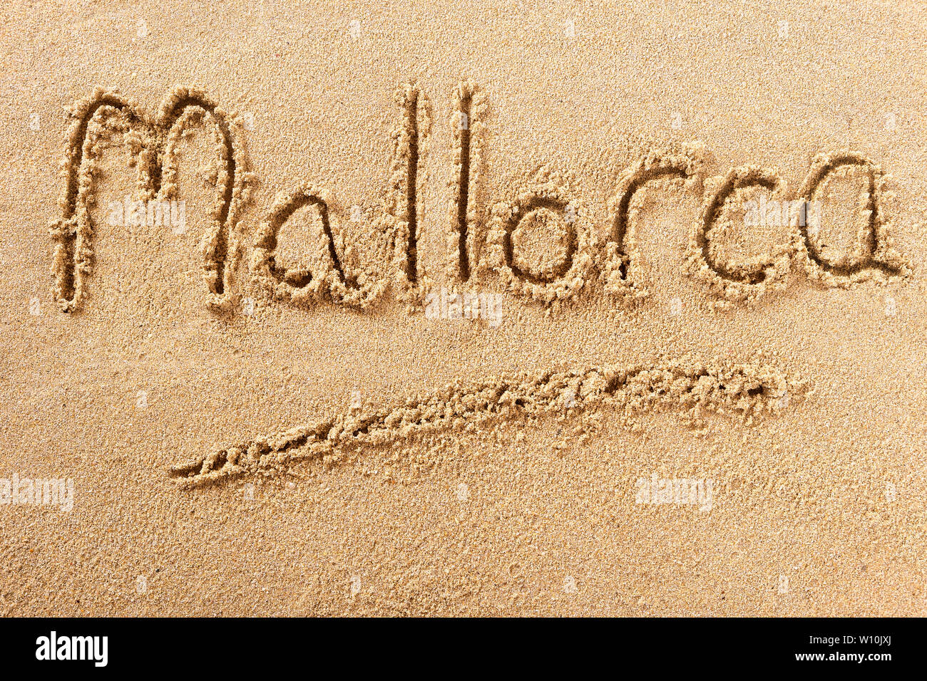 Mallorca hand written beach word travel concept Stock Photo - Alamy