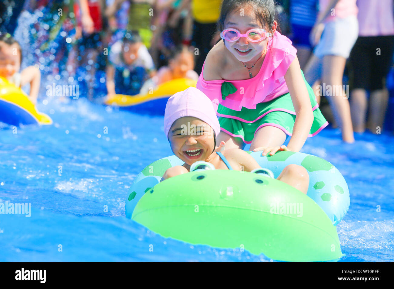 Shaoyang, China's Hunan Province. 28th June, 2019. Kids play in the ...