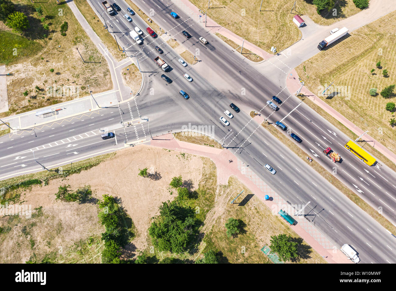 view of a suburban neighborhood street and intersection. highway ...