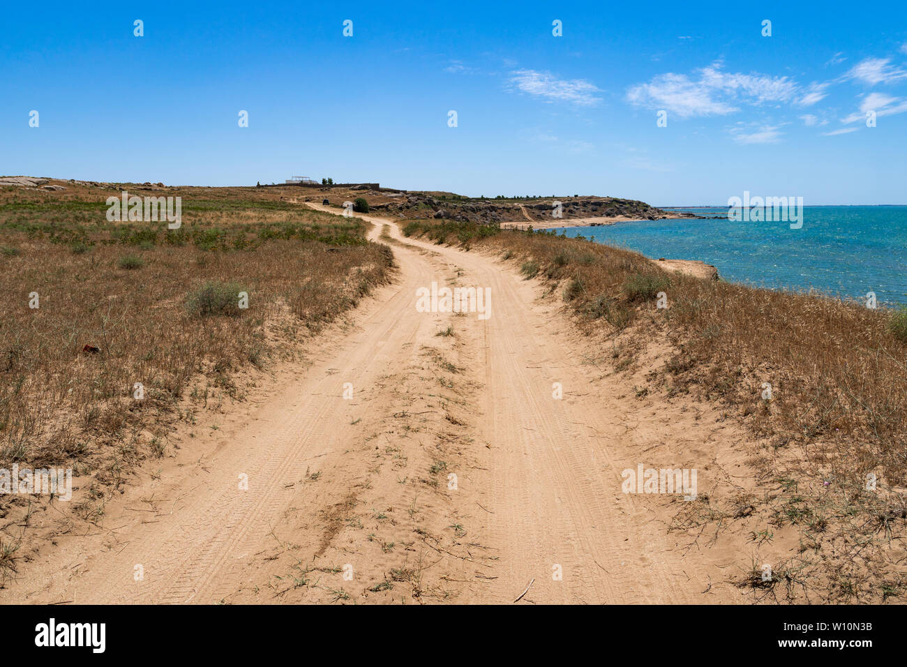 Dirt road along the sea coast Stock Photo - Alamy