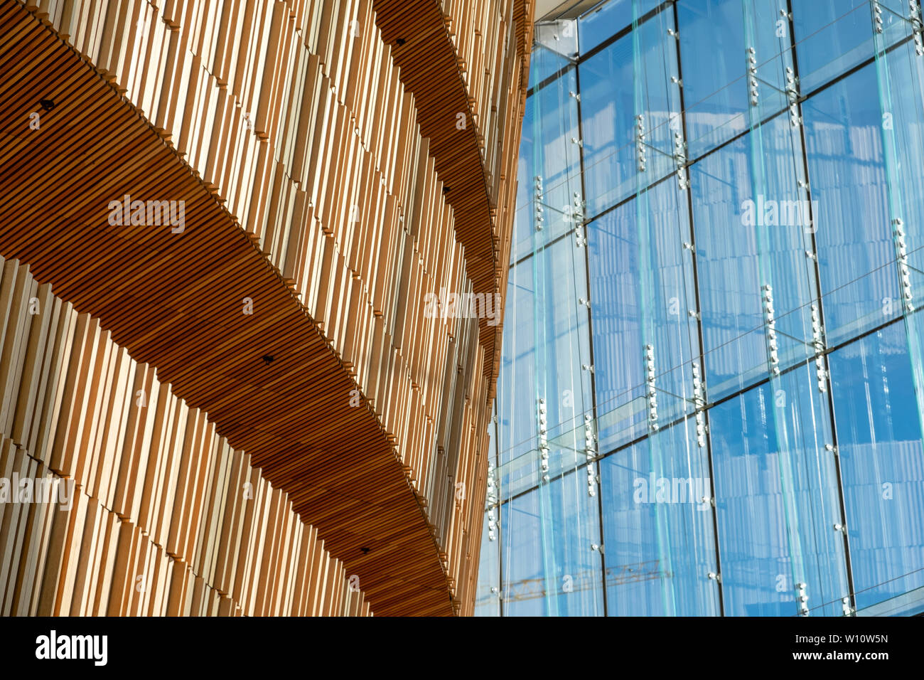 Oslo, Norway - Mar 27 2018 : Sunlight through blue glass windows on ...