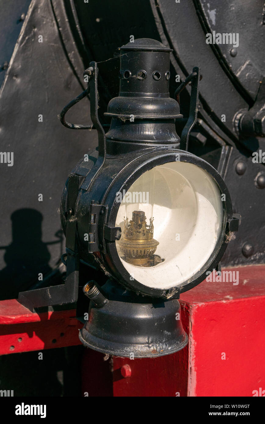 Old cast metallic locomotive lamp Stock Photo - Alamy