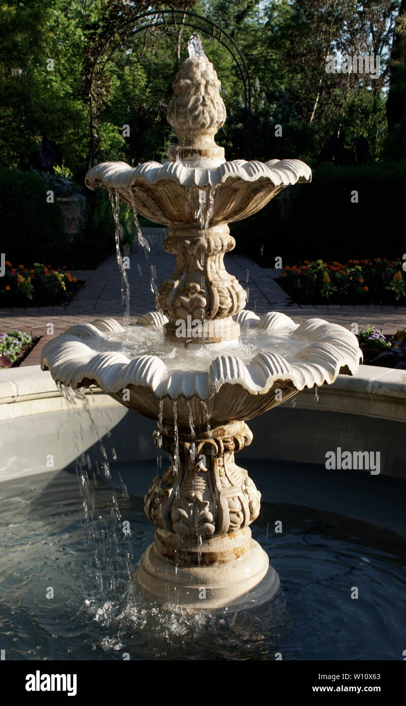Fountain with flowing water Stock Photo - Alamy