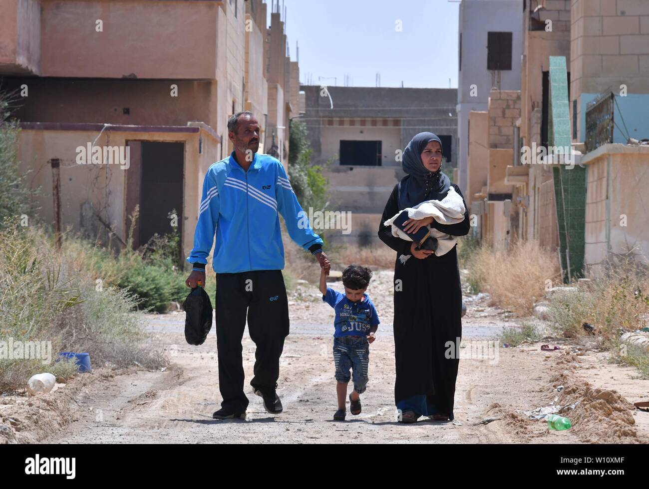 Old syrian man walks hi-res stock photography and images - Alamy