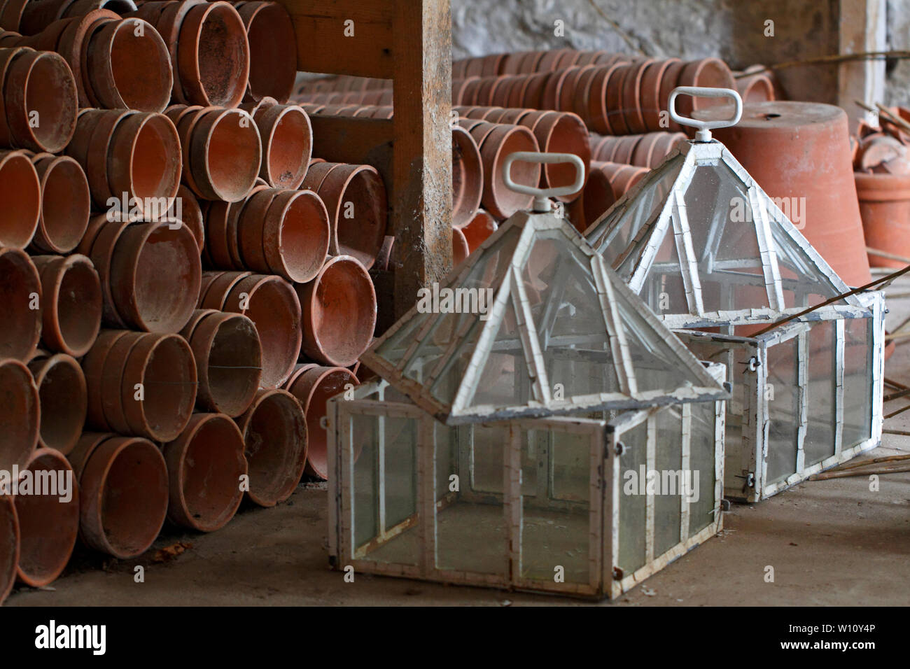 pot store with clay pots and Victorian cloches Stock Photo - Alamy