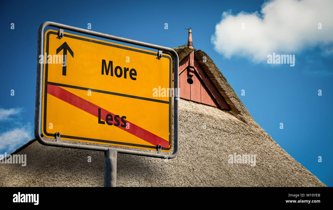 Street Sign the Direction Way to More versus Less Stock Photo - Alamy